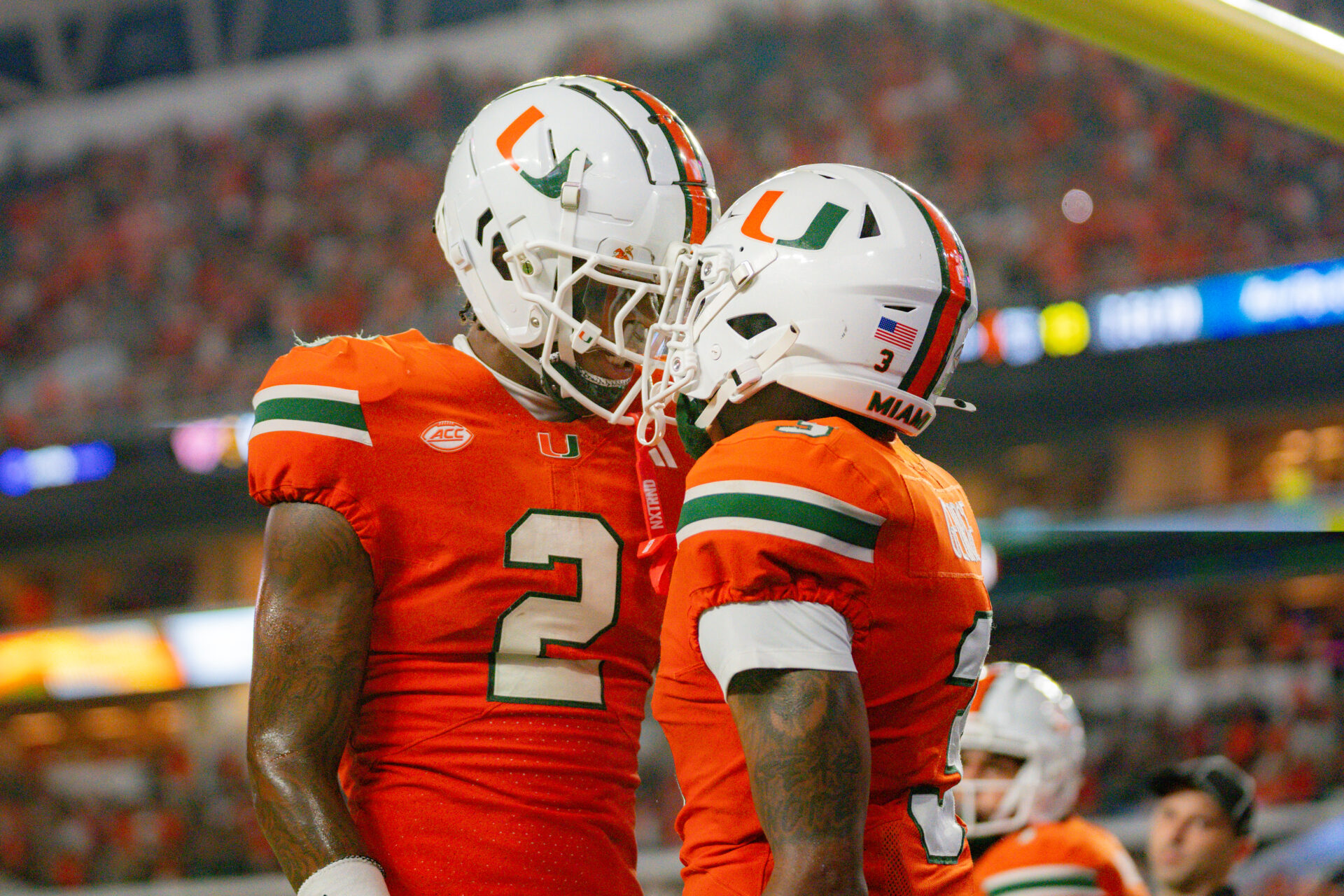 Miami football tops Louisville 52-45 in thrilling back-and-forth clash ...